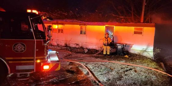 Stranger saves the life of a female who was inside of a burning home ...